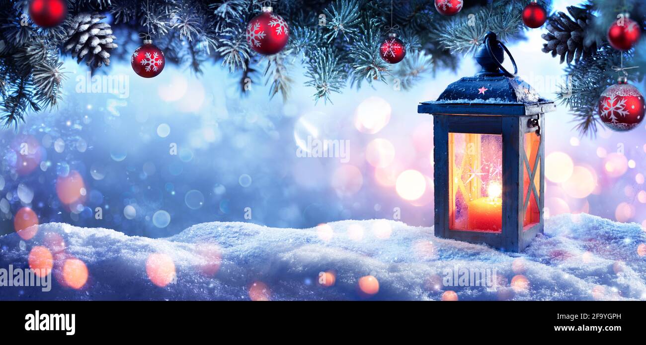 Christmas Lantern On Snow With Snowy Fir Branches And Baubles Stock ...