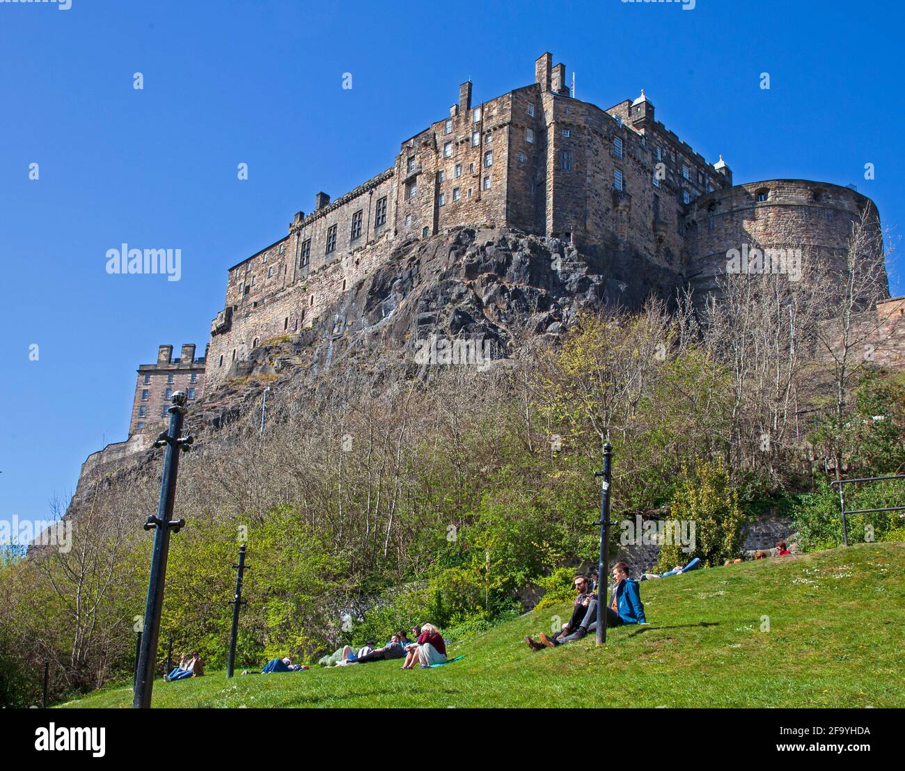 Edinburgh, Scotland, UK weather. 21st April 2021. People sitting in the ...