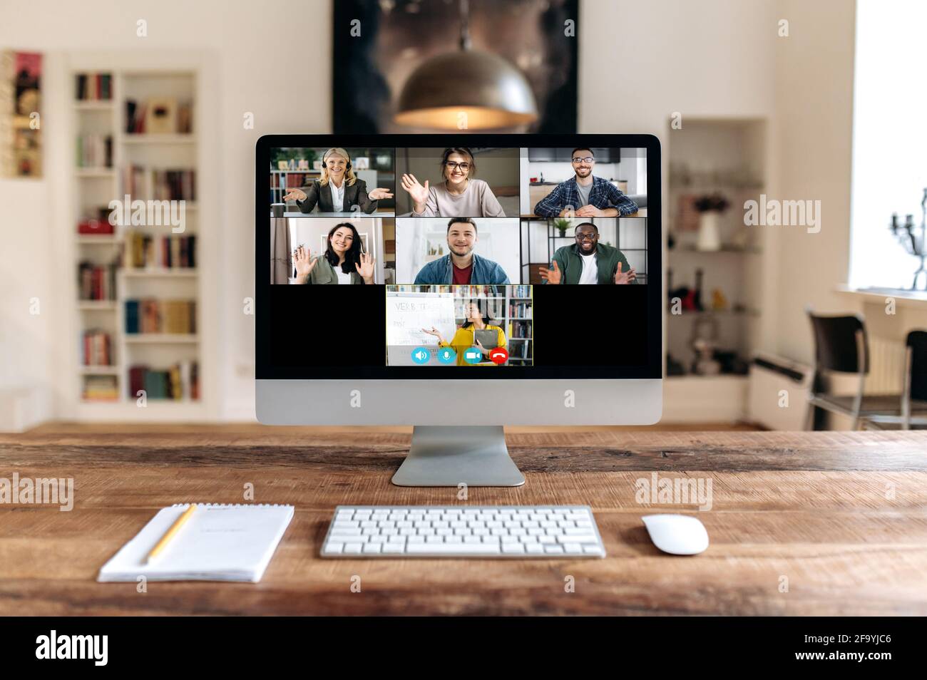 Distance learning. Computer monitor with multiracial people, female ...