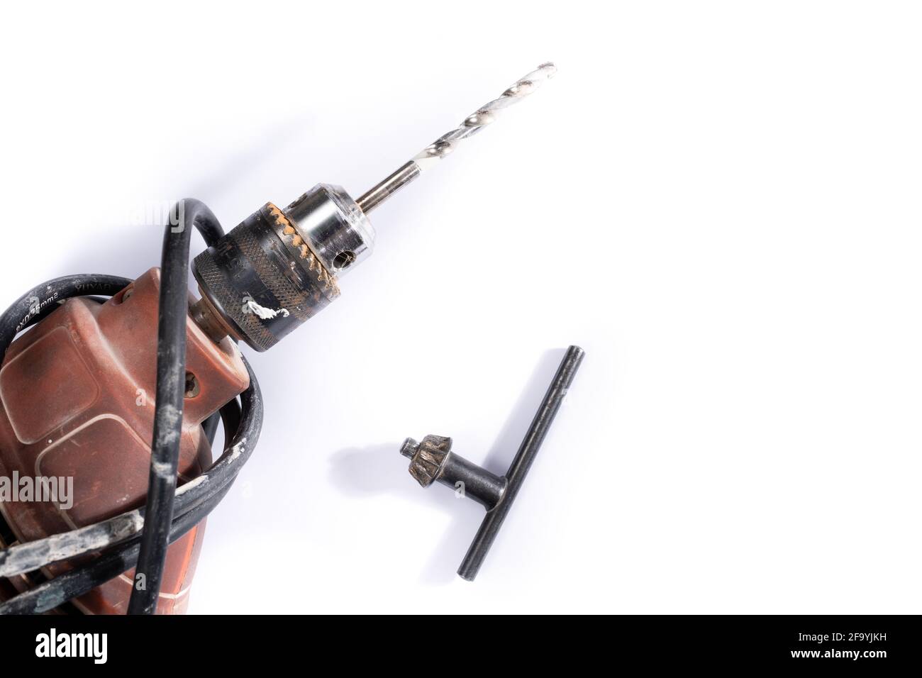 Closeup shot of a drilling machine on a white background Stock Photo ...