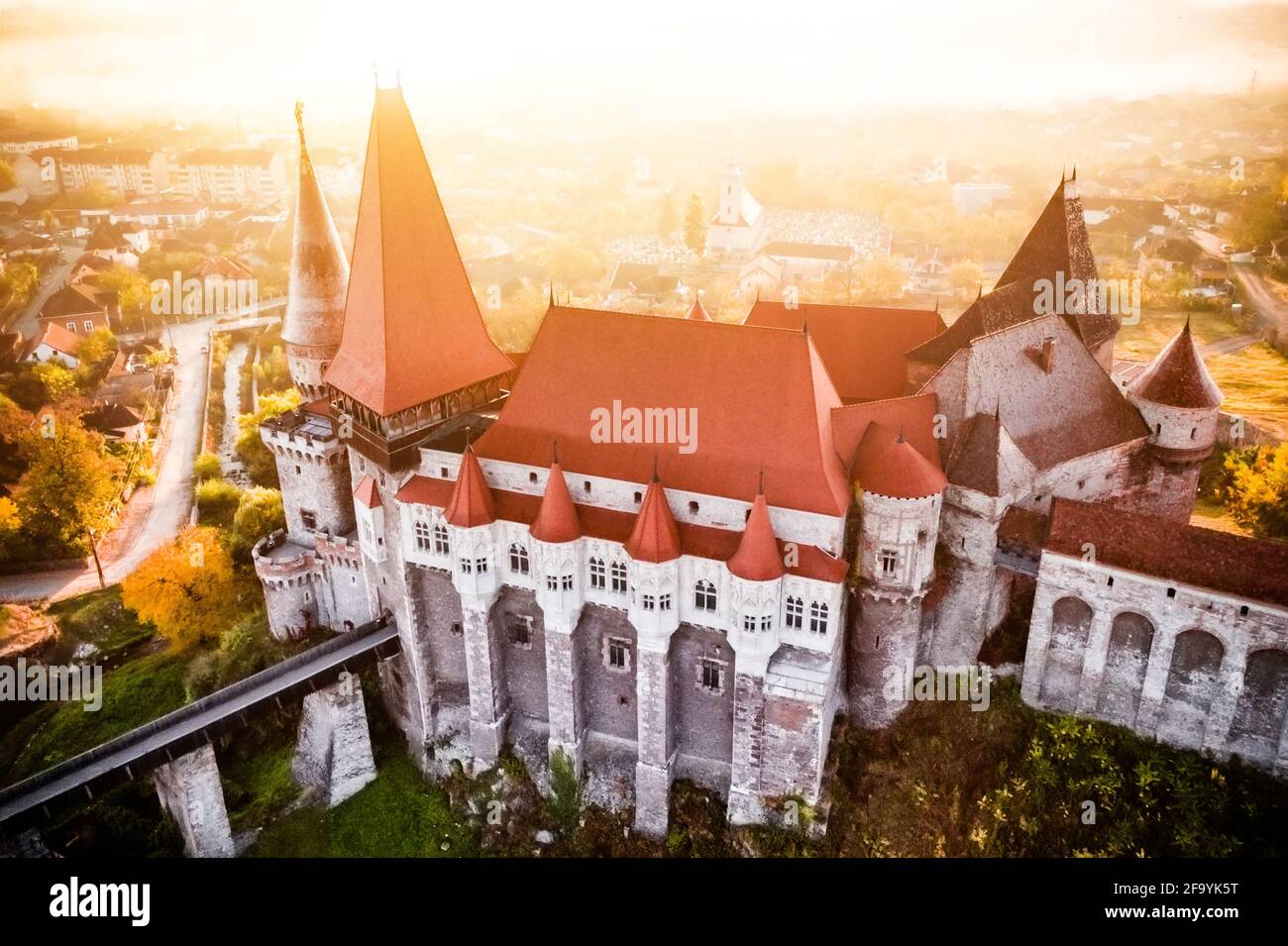 Spiked roofs and imposing towers of Hunyadi Castle Stock Photo - Alamy