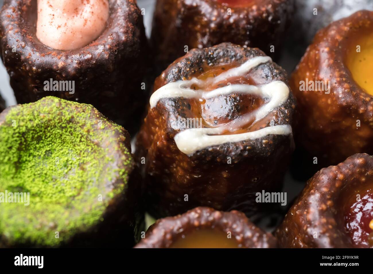 Caneles de bordeaux is a small pastry with rum and vanilla, traditional ...