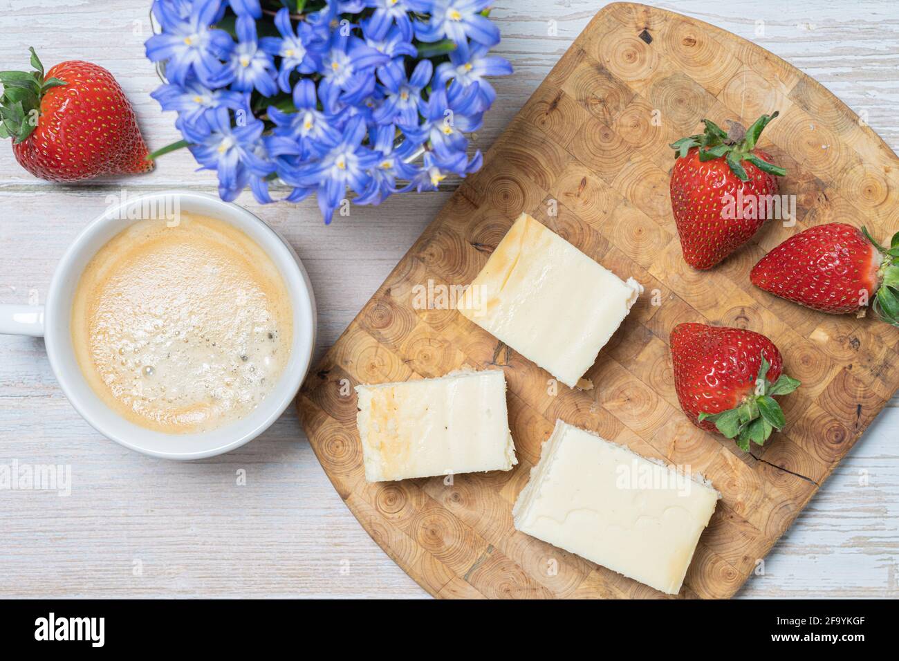 Ripe, red strawberries, pieces of pie with cottage cheese, coffee ...