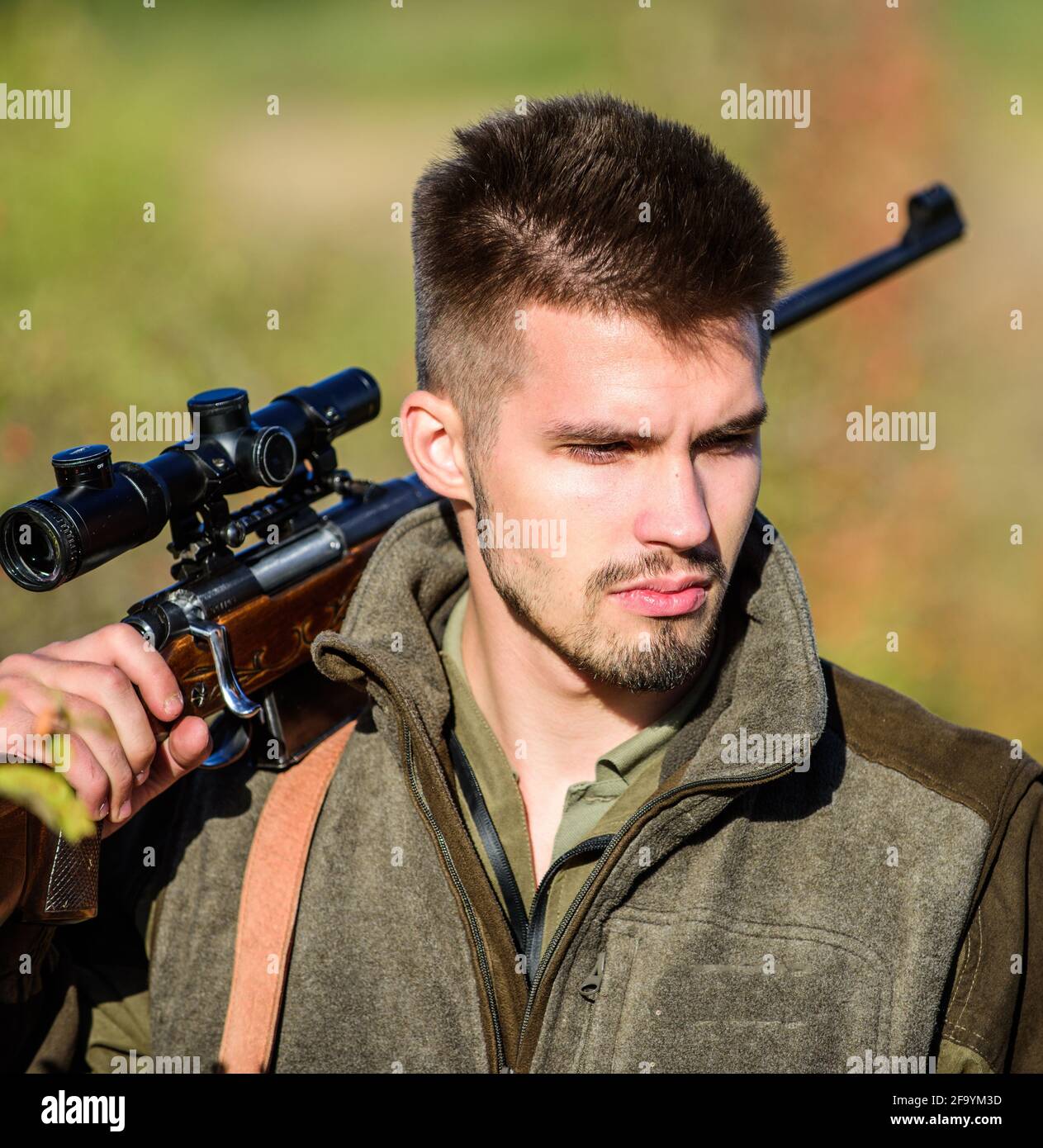 Man hunter with rifle gun. Boot camp. Bearded man hunter. Army forces ...