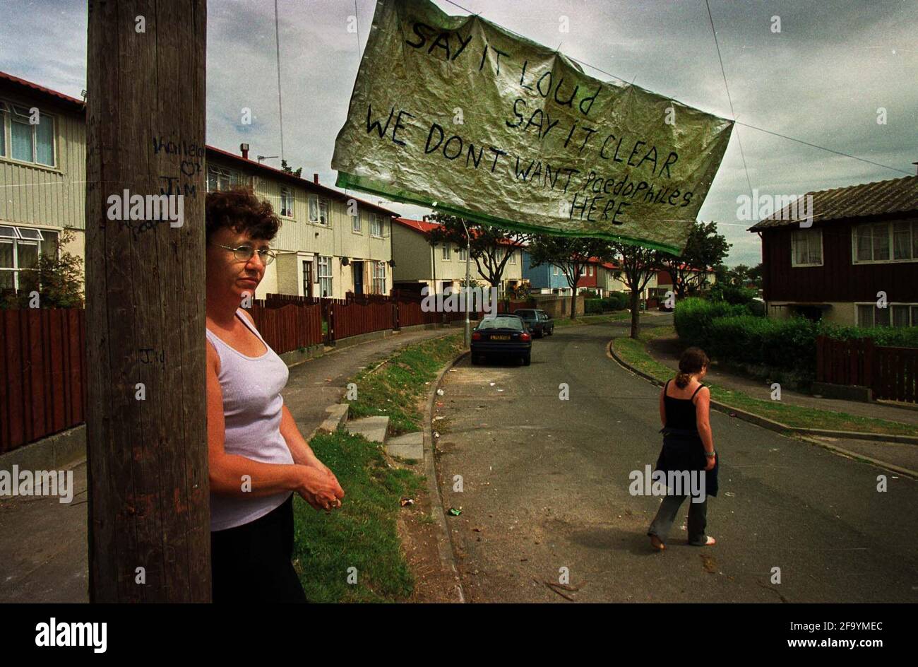 Linda Webb stands by her poster outside her August 2000house in the ...