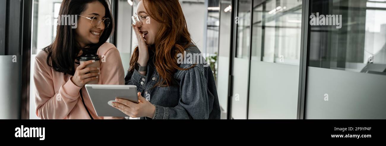 happy and pretty students laughing in hall, banner Stock Photo - Alamy
