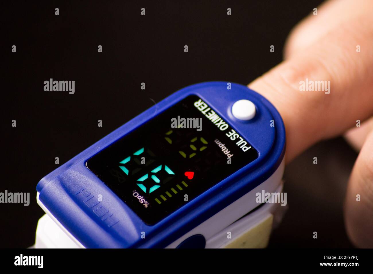 Pulse oximeter with hand of patient. Pulse Oximeter portable digital ...