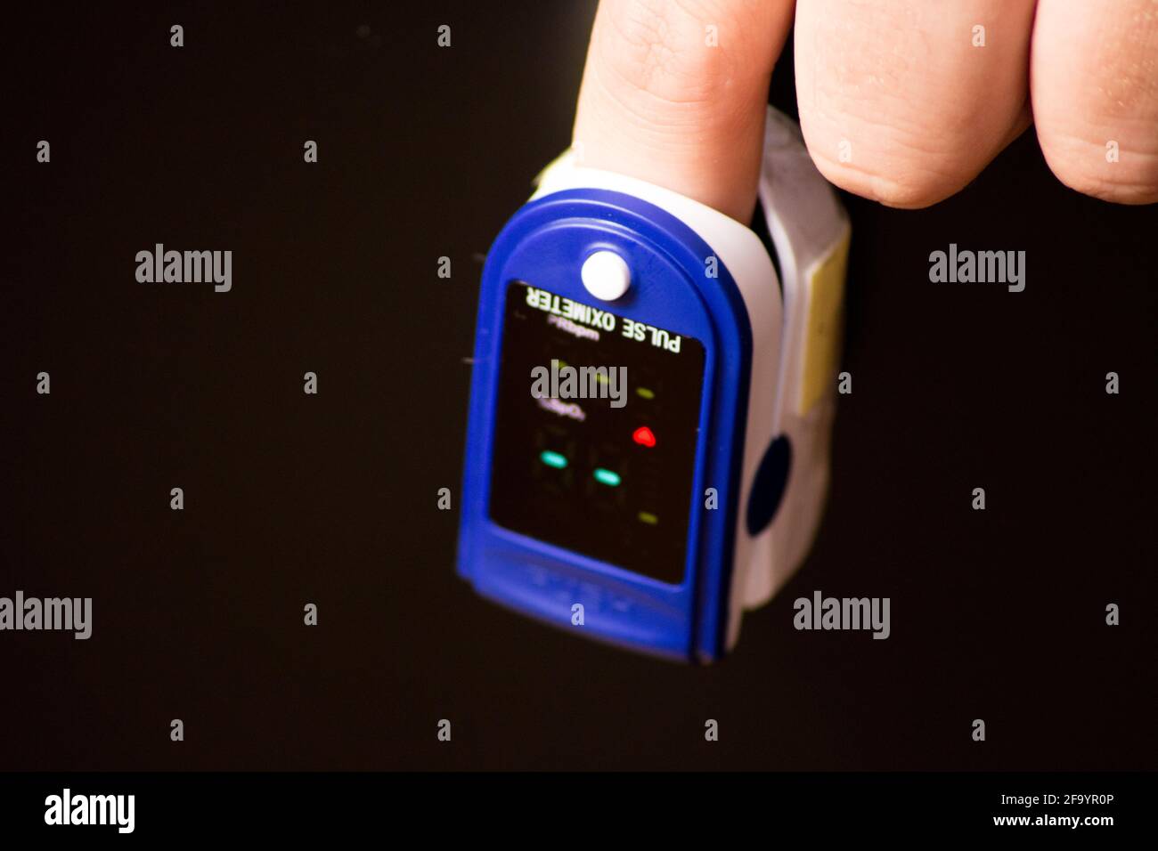 Pulse oximeter with hand of patient. Pulse Oximeter portable digital ...