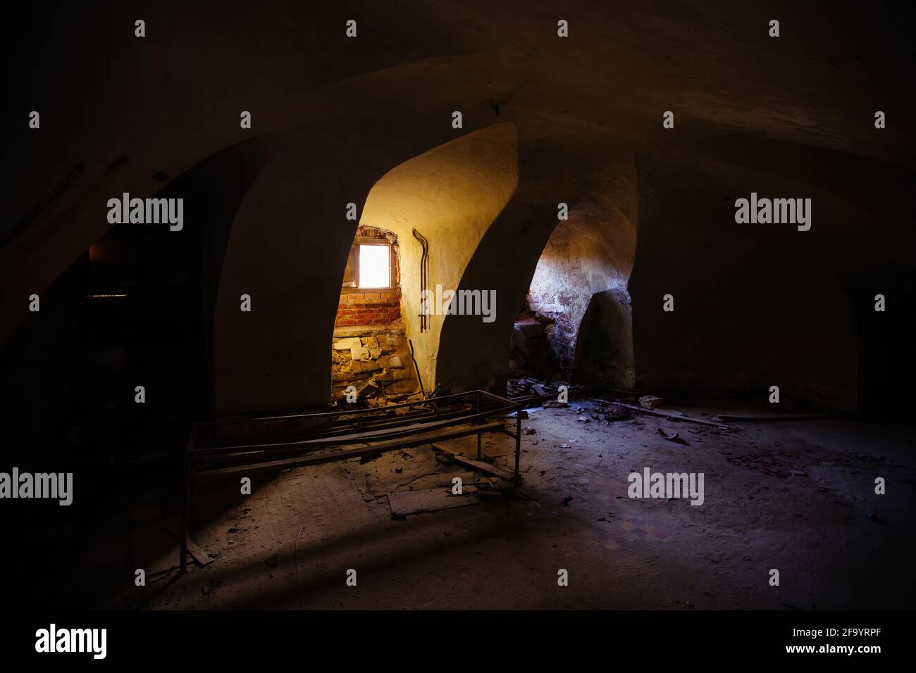 Old vaulted red brick cellar under abandoned building Stock Photo - Alamy