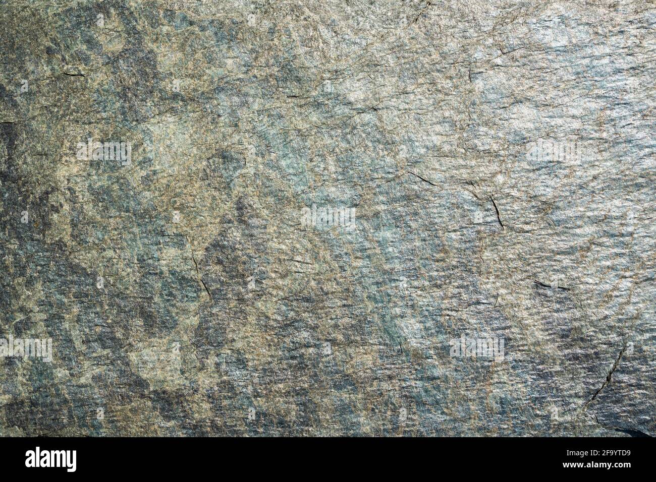 old green rock structure with gradient. natural stone background ...