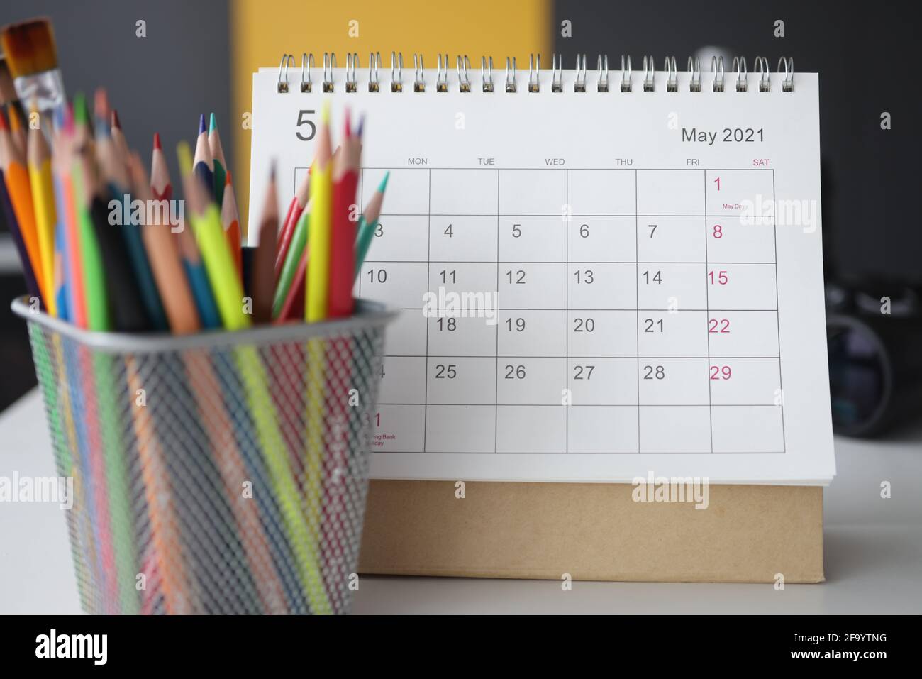 Calendar for May with colored pencils is on table Stock Photo - Alamy