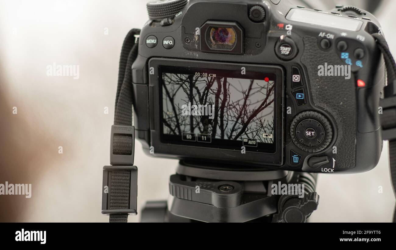 Digital camera set up in a landscape for shooting the beautiful view of ...