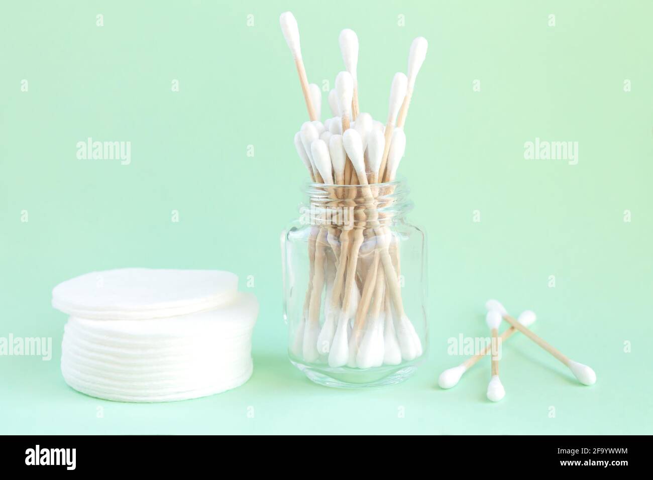Bamboo organic cotton swabs in glass jar and cotton pads for personal ...