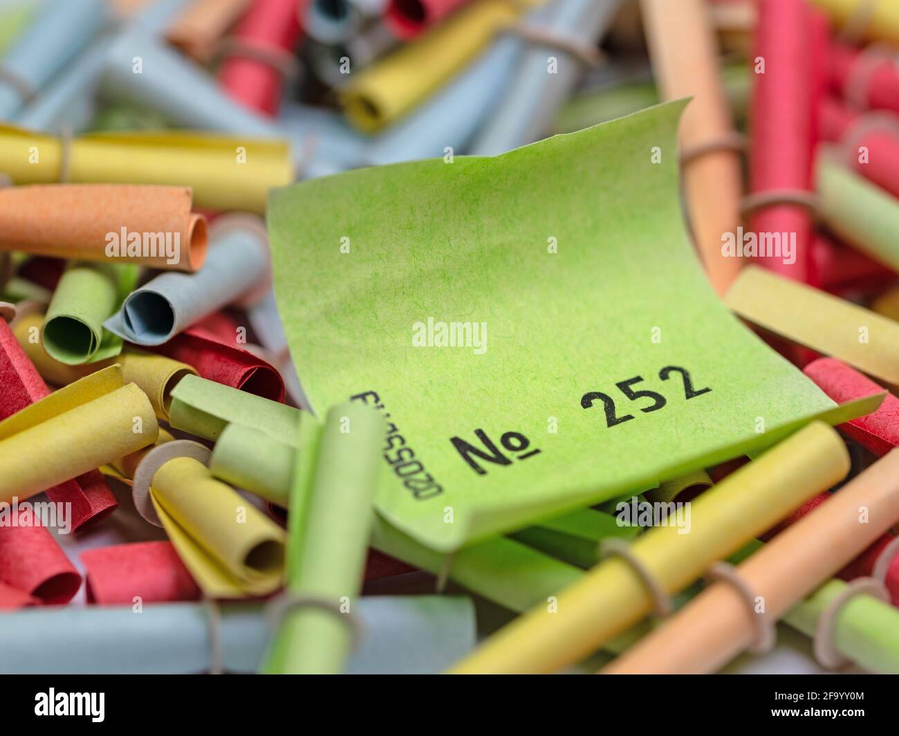 Many raffle tickets with a winning number Stock Photo - Alamy