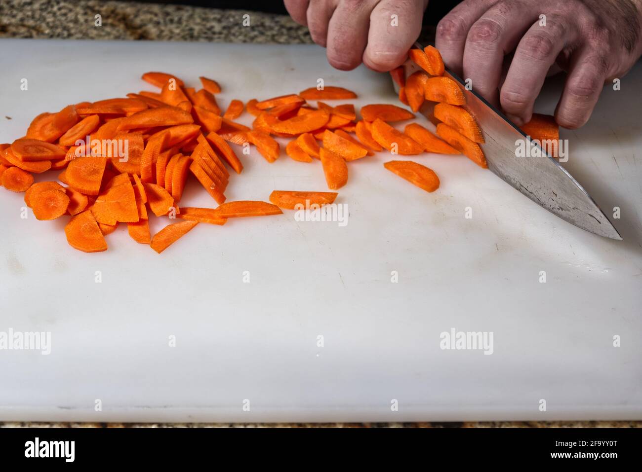 Chopping carrots hi-res stock photography and images - Alamy