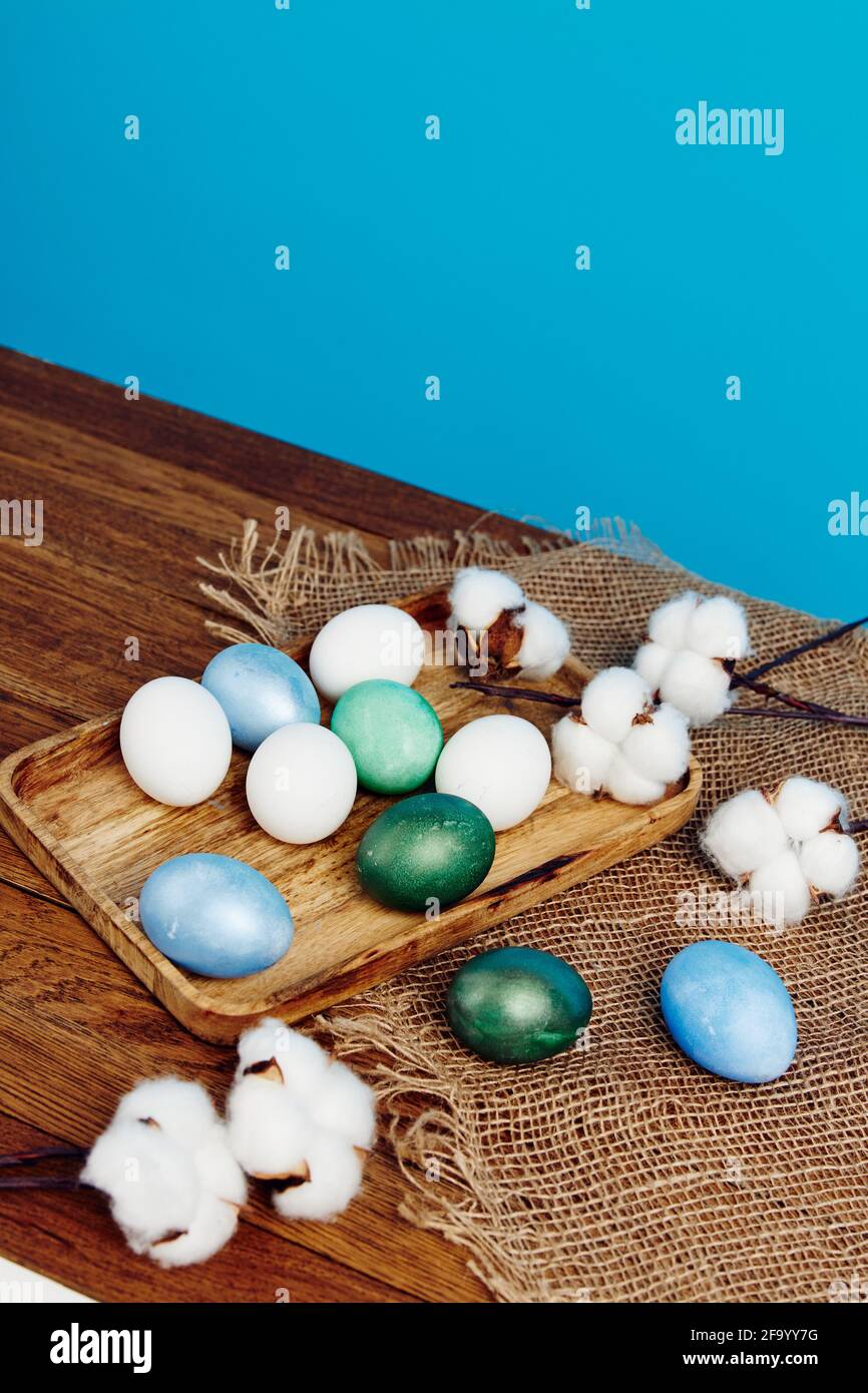 Easter church holiday colorful eggs on chalkboard and blue background ...