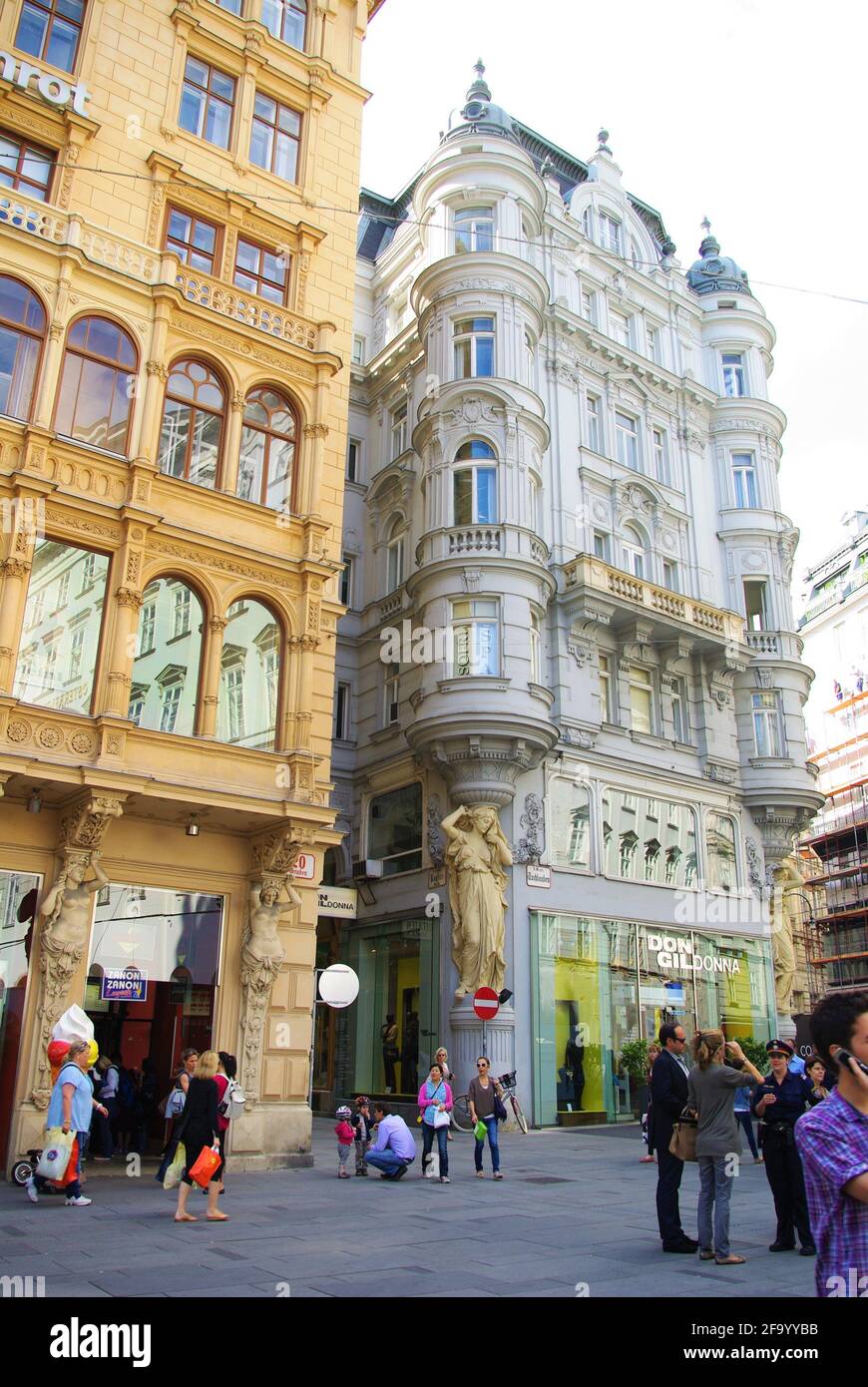 Street scene with shoppers in front of beautiful Art Nouveau style ...