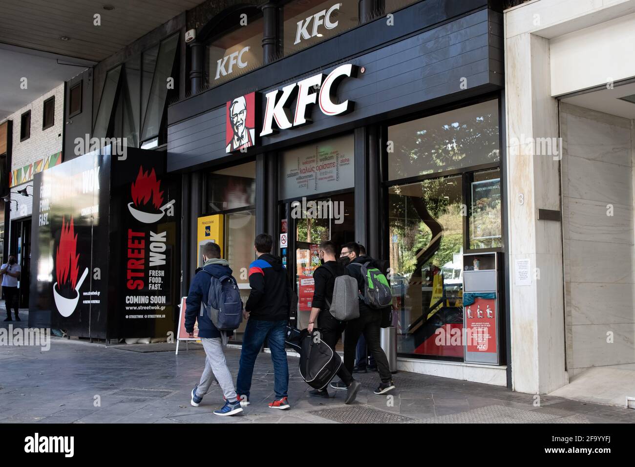 Athens, Greece. 21st Apr, 2021. People walking past a KFC Fast Food ...