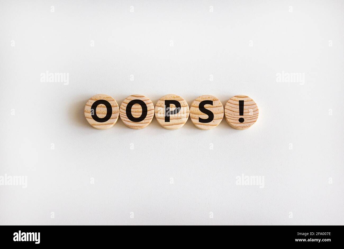 Oops symbol. Oops sign on wooden cut circles. Beautiful white ...