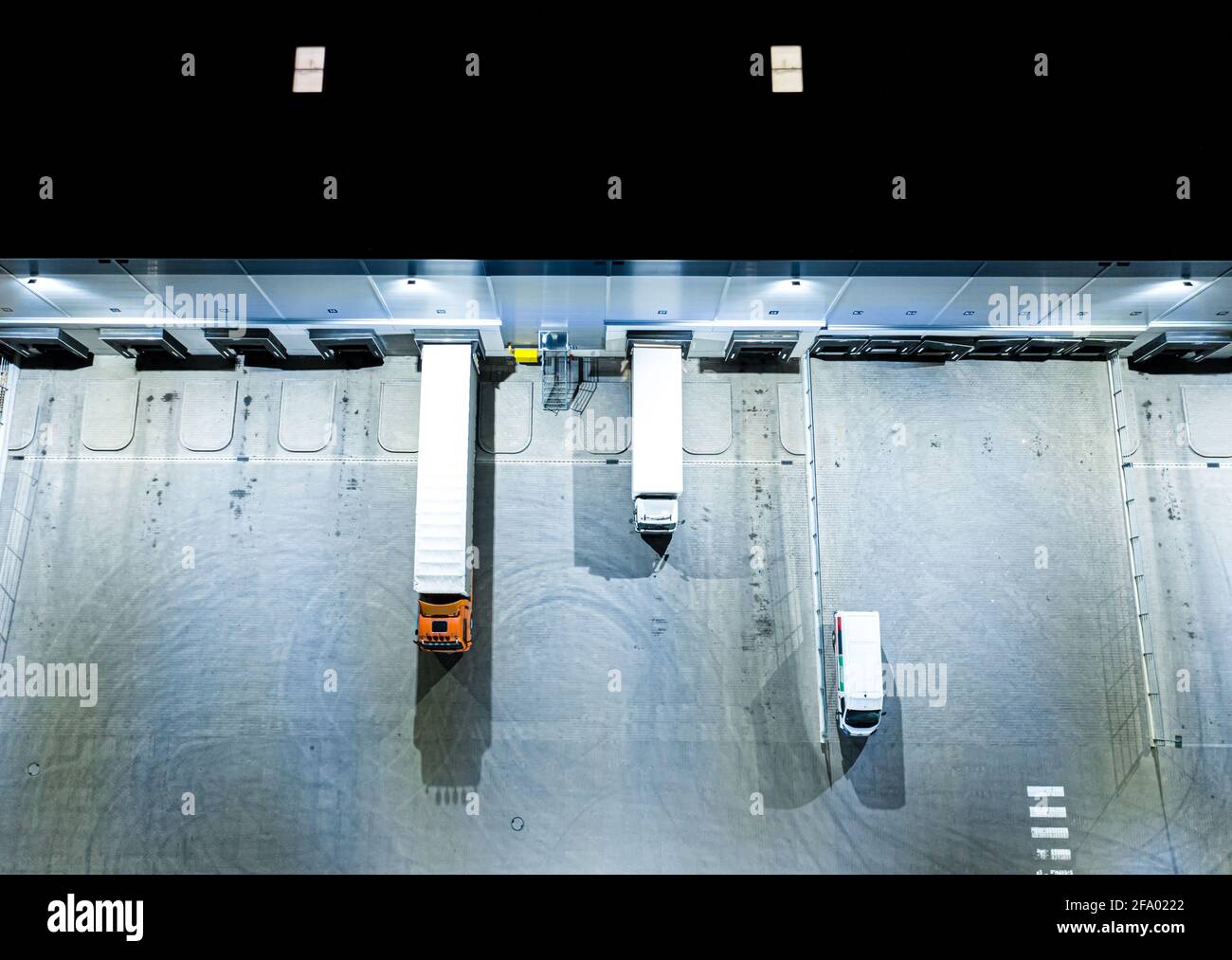 Night Aerial view of goods warehouse. Logistics center in industrial ...