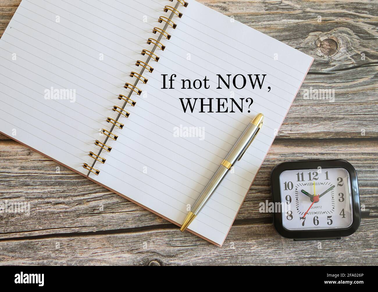 If not now, when written on a notebook Stock Photo - Alamy