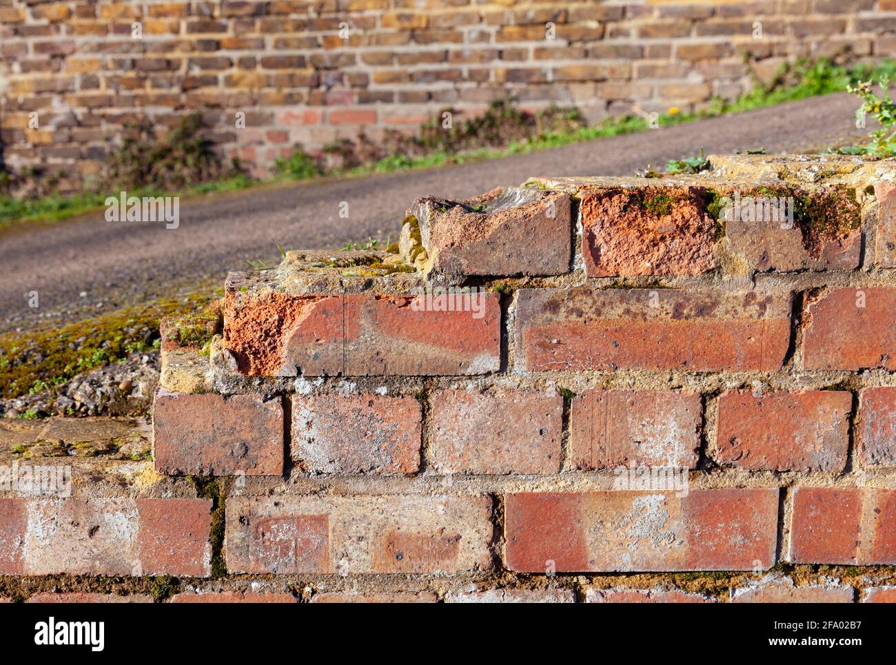 UK, England, London, Southall, Old crumbling Brick Wall at entrance to ...