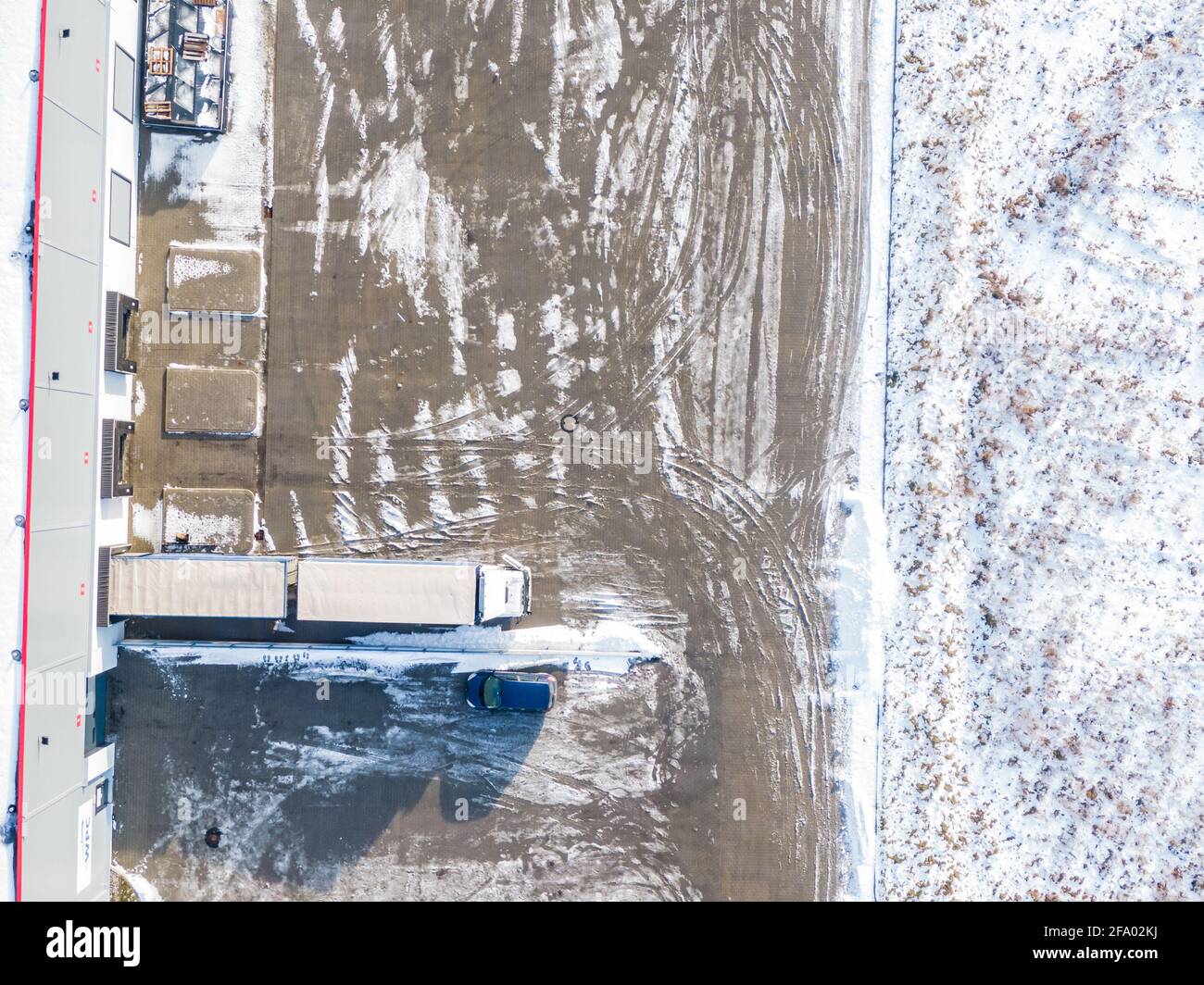 Aerial view of the logistics park with warehouse, loading hub and many ...