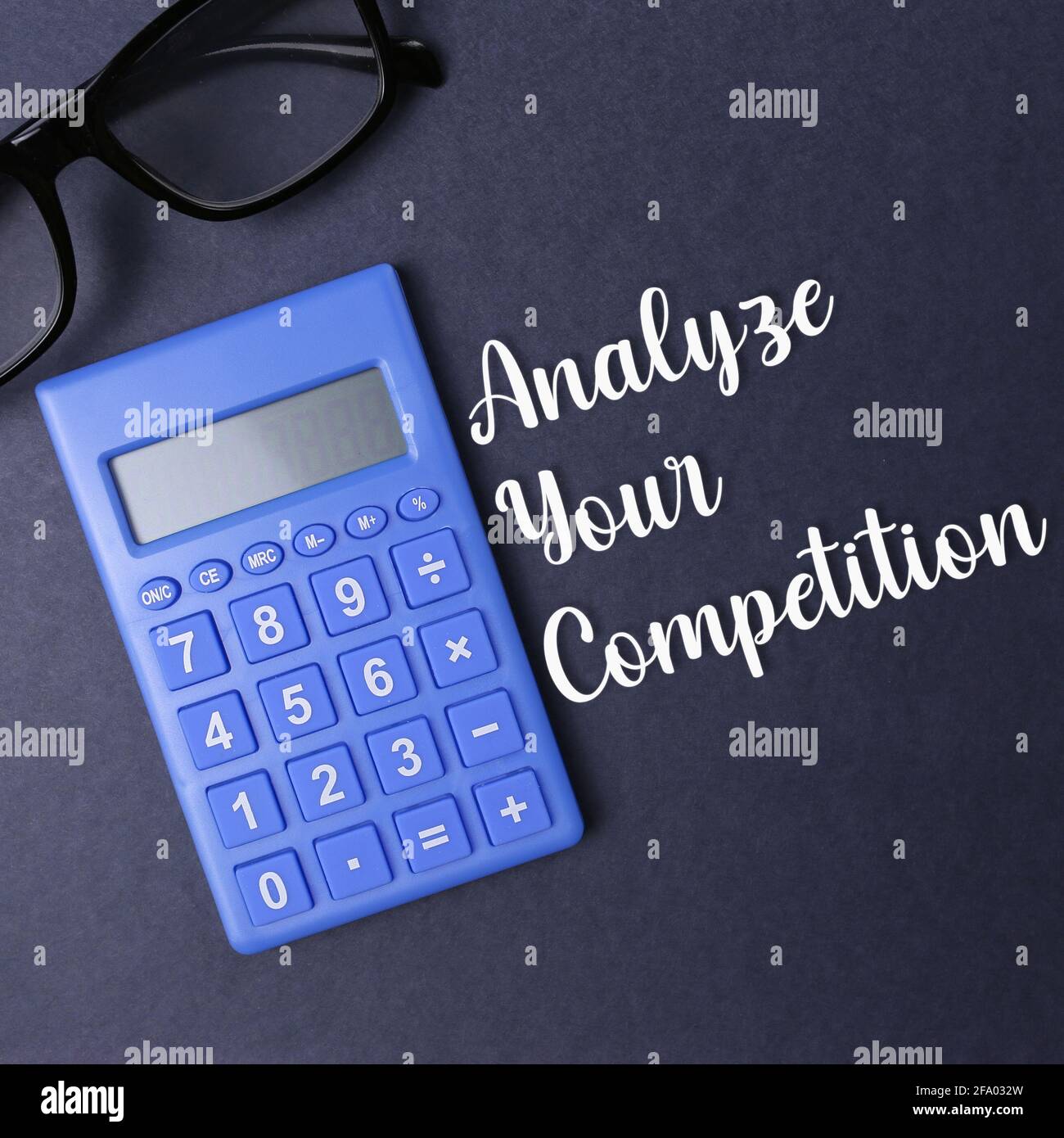 Top view of a glasses and calculator with text Analyze your competition ...