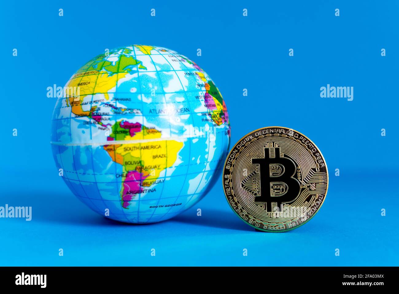 Bitcoin BTC crypto currency gold coin and Earth globe, worldwide new ...