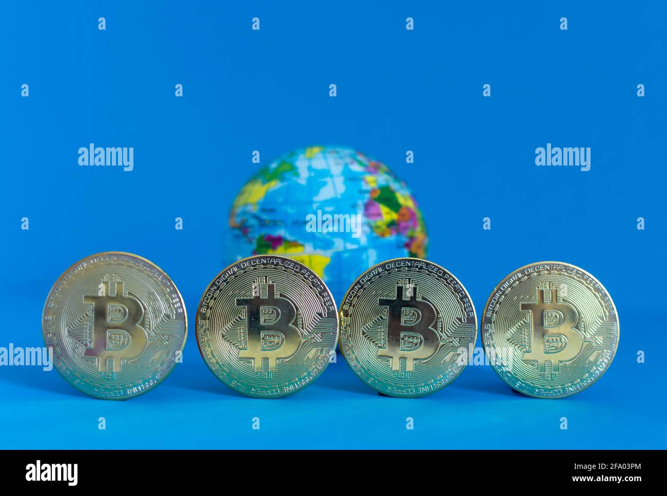 Bitcoin BTC crypto currency gold coins and Earth globe, worldwide new ...