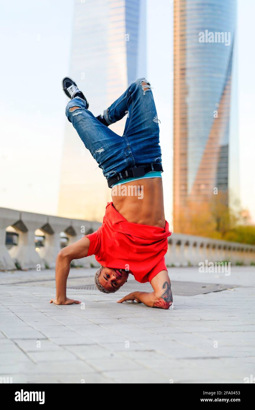 breakdancing man dancing in town Stock Photo - Alamy