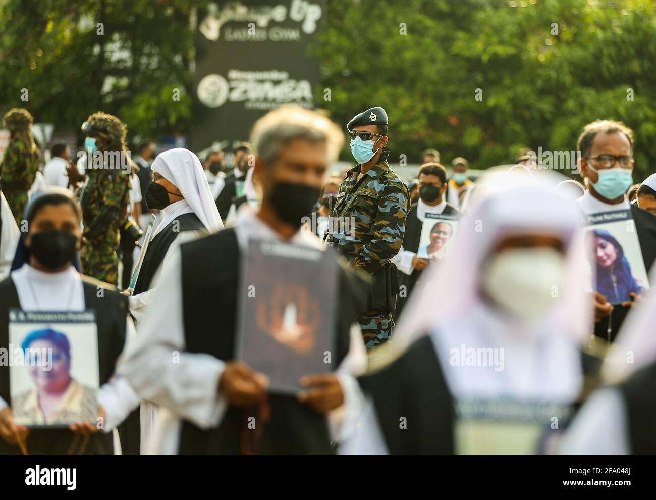 Negombo, Sri Lanka. 21st Apr, 2021. Catholic priests and nuns carry ...