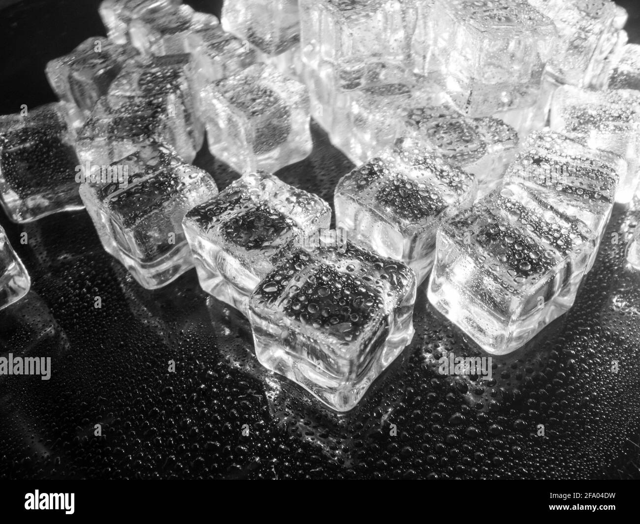 Artificial ice cubes on Black and White Stock Photos & Images - Alamy