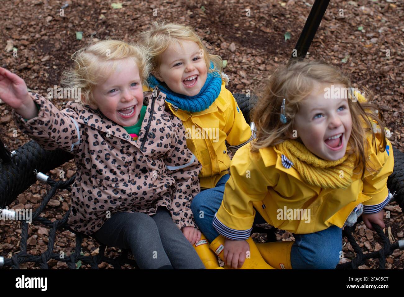 Children under 5's playing on playground equipment Stock Photo - Alamy