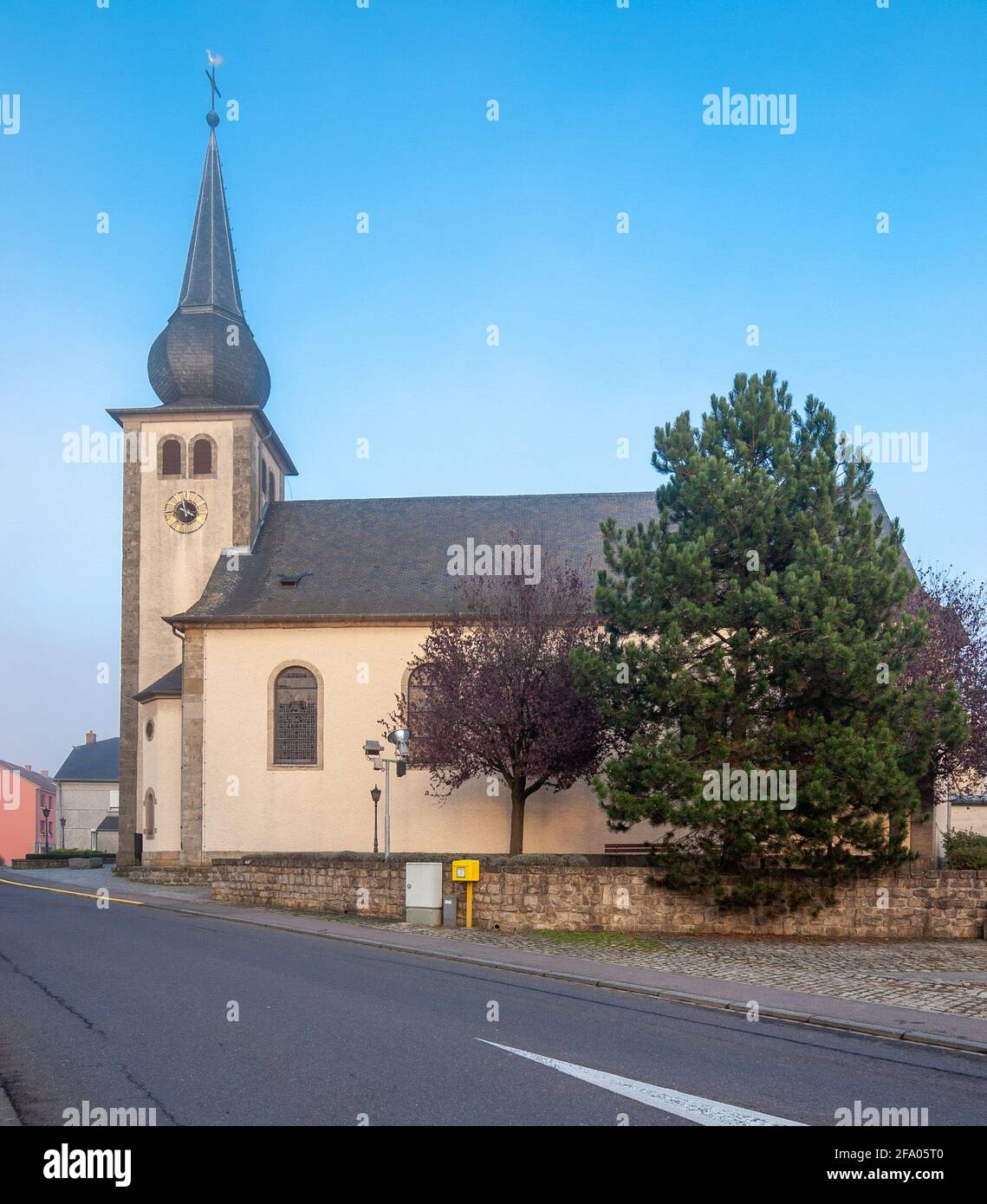 Christian church in Moutfort - Luxembourg Stock Photo - Alamy