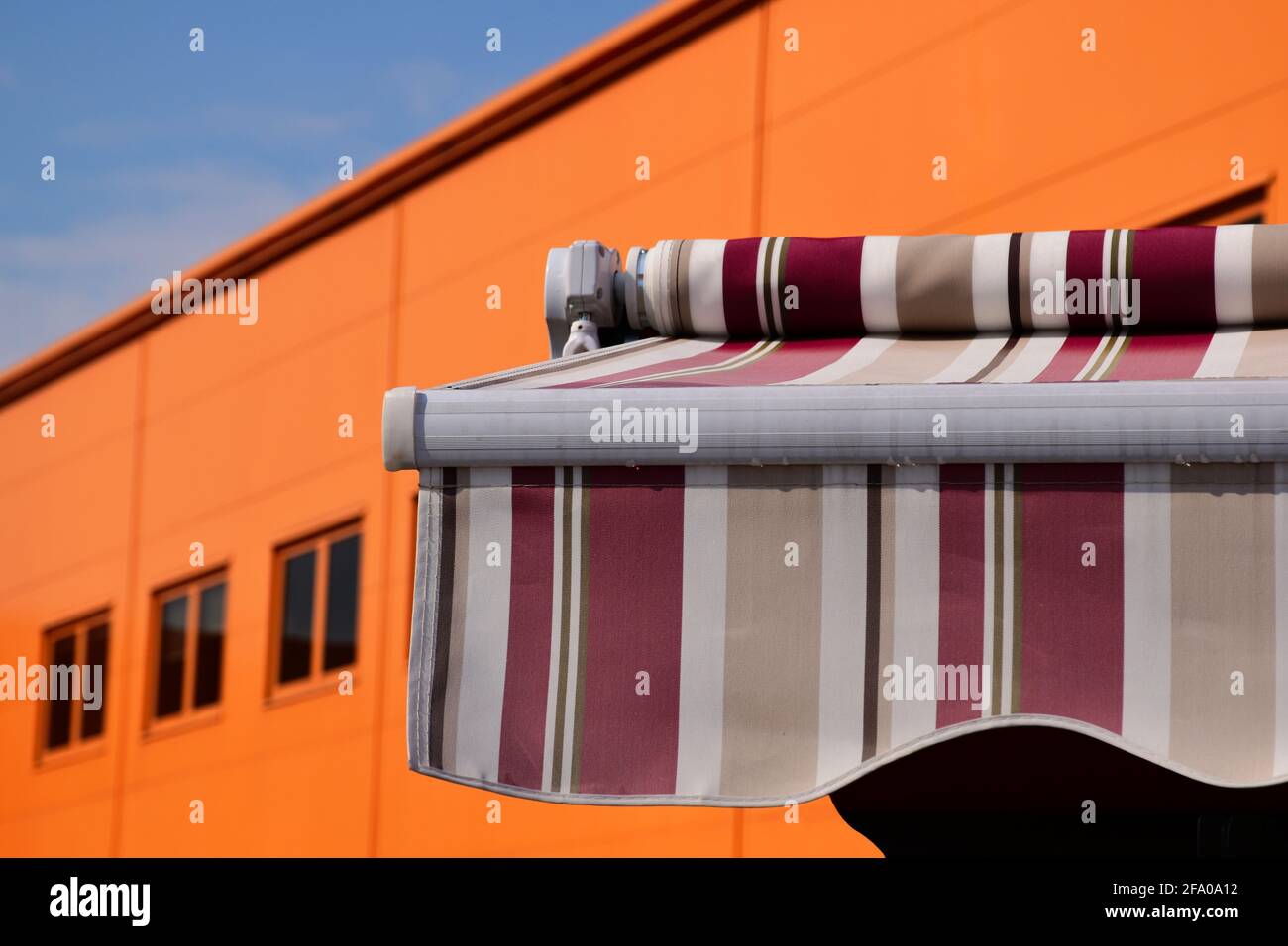 Retractable canvas awning, sun protection. high angle view. clear blue ...