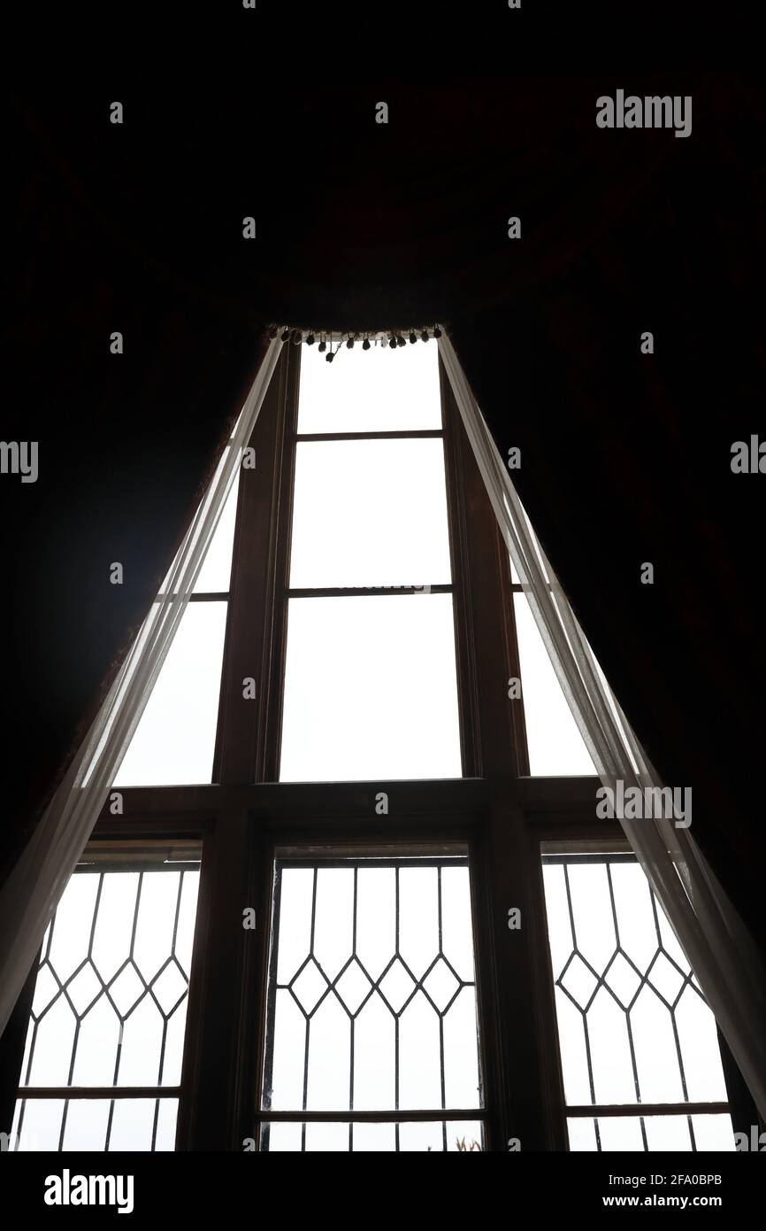 Part of window with curtains in old mansion Stock Photo - Alamy
