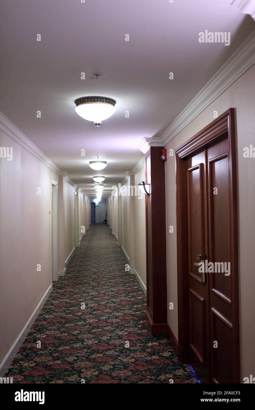The corridor of a hotel at night Stock Photo - Alamy