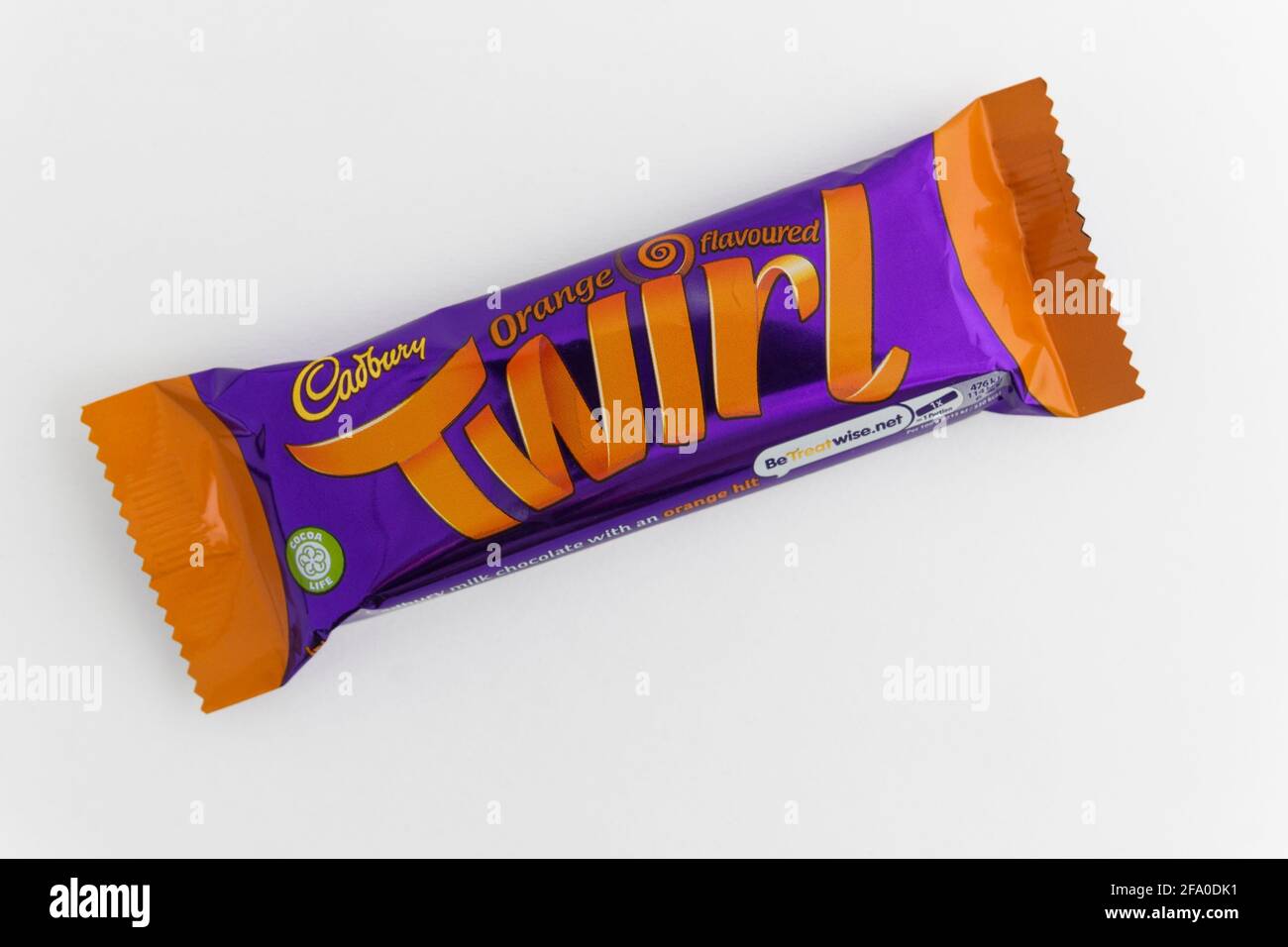 Cadbury orange twirl bar on a white background Stock Photo - Alamy