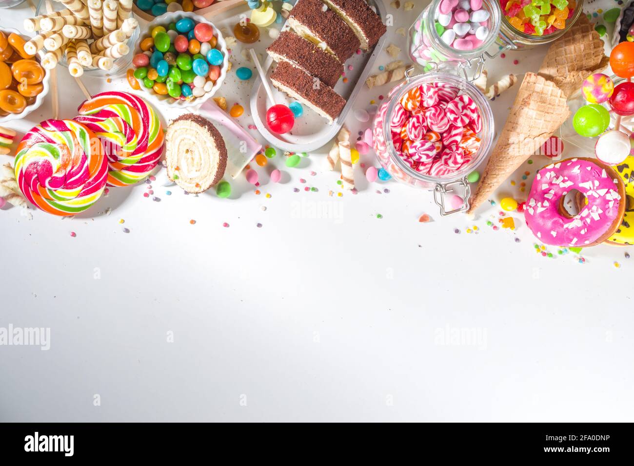 Selection of colorful sweets. Set of various candies, chocolates ...