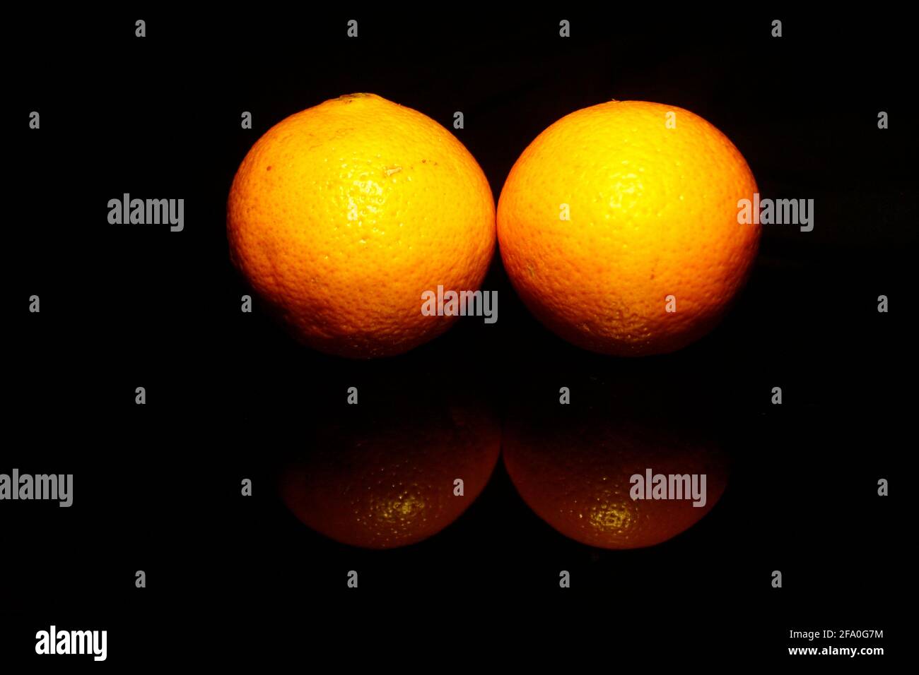 Two mandarin orange hi-res stock photography and images - Alamy