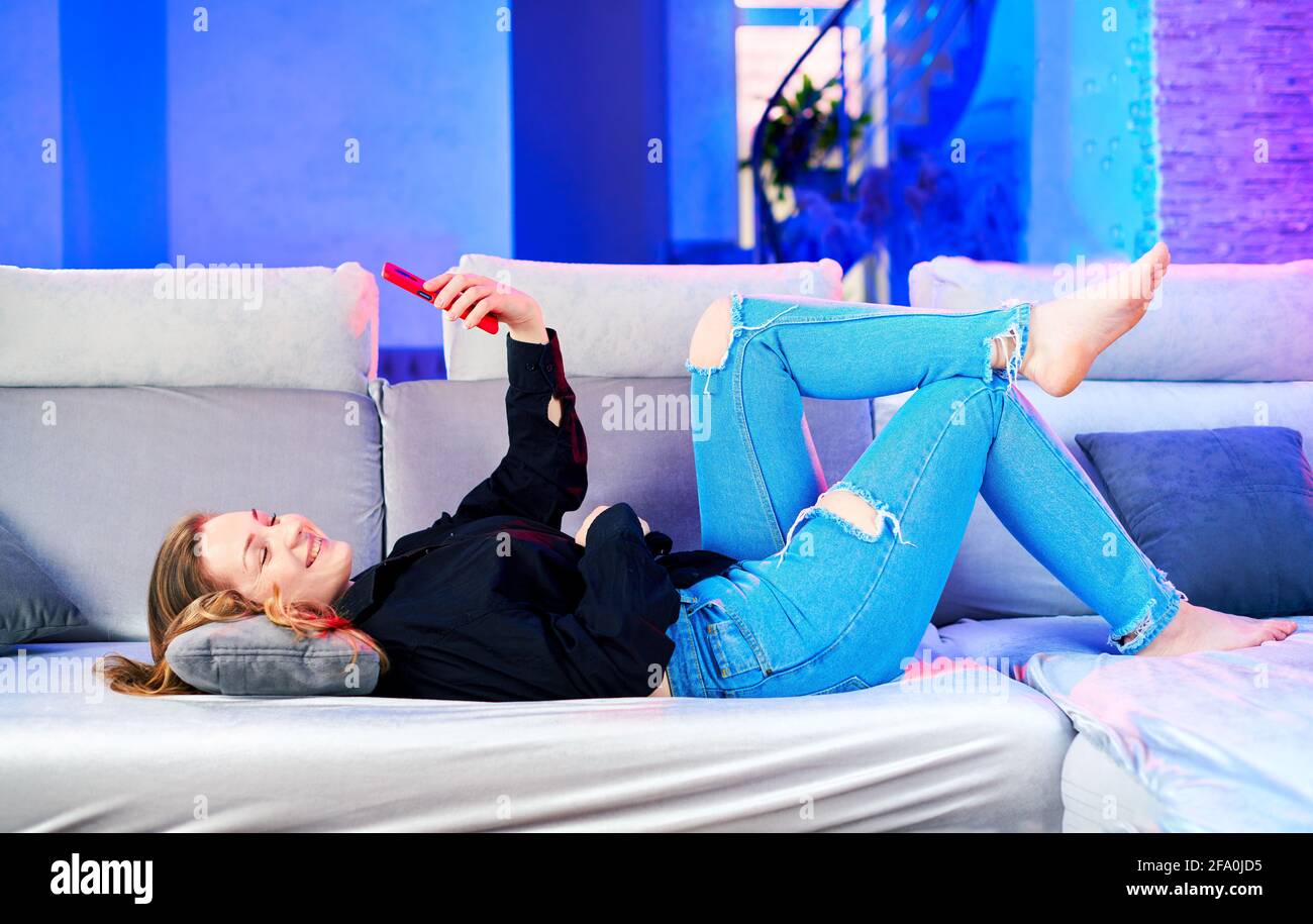 girl making plans for the future on the couch Stock Photo - Alamy