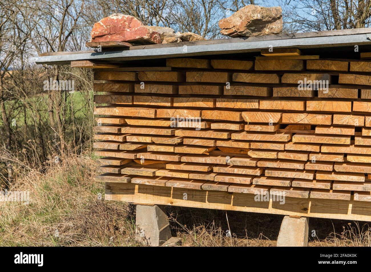 Timber warehouse. Detail wooden planks. Air-drying timber stack. Wood ...