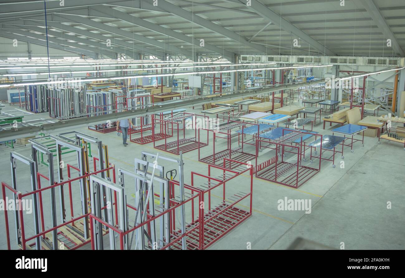 Modern warehouse with colorful equipment Stock Photo - Alamy