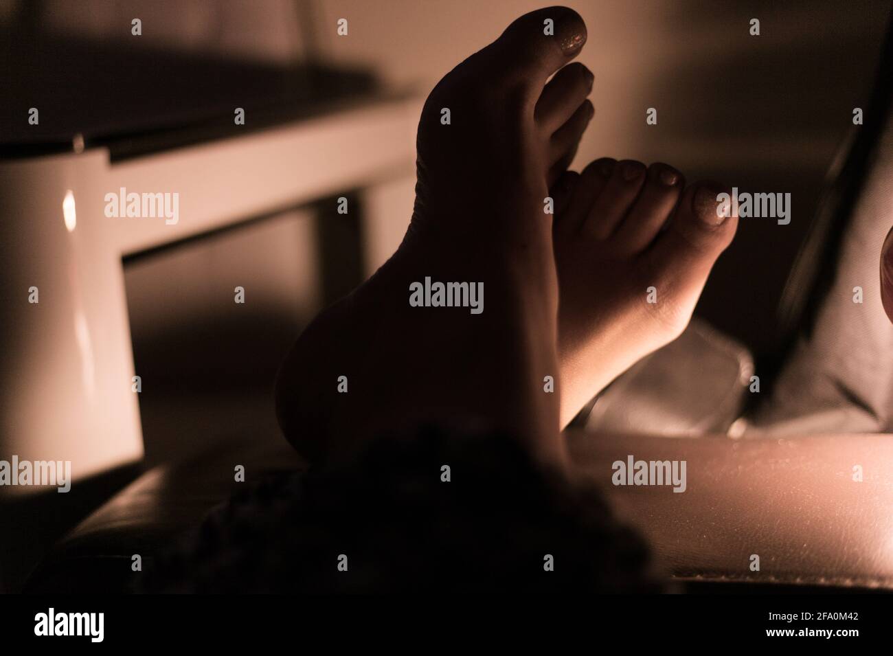 Abstract view of a pair of feet Stock Photo - Alamy