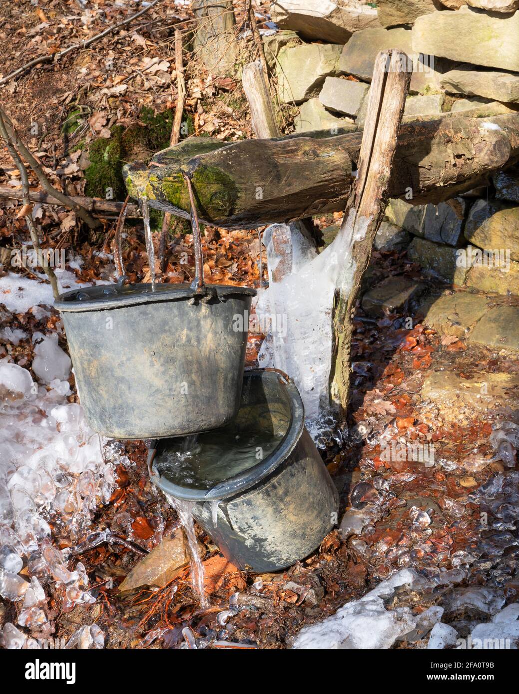 Wooden water buckets hi-res stock photography and images - Alamy