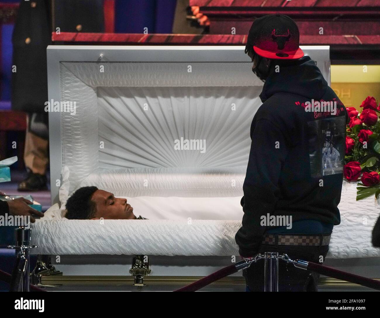 Minneapolis, United States. 21st Apr, 2021. AJ Wright stands next to ...