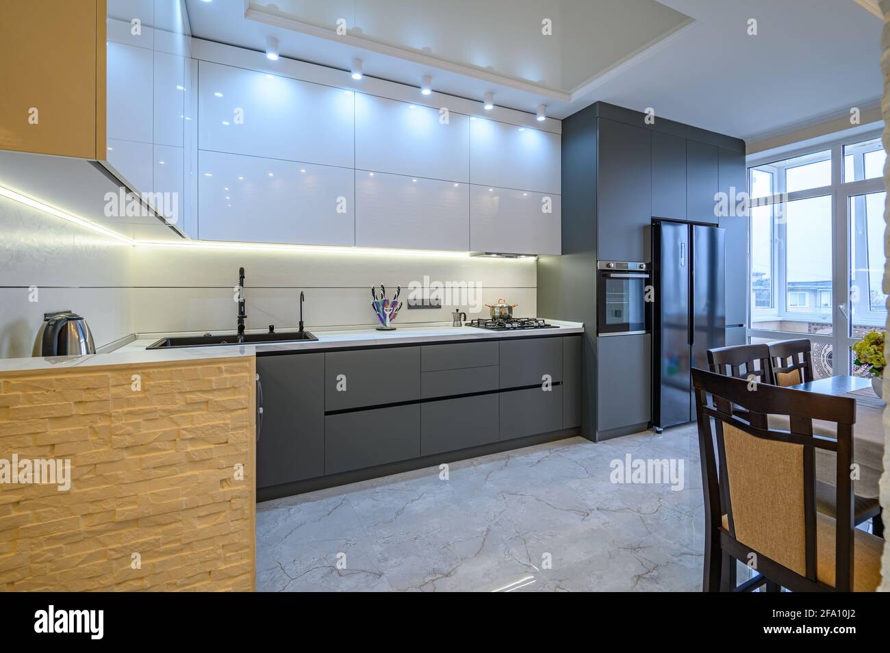 Luxury white and dark grey modern kitchen interior Stock Photo - Alamy