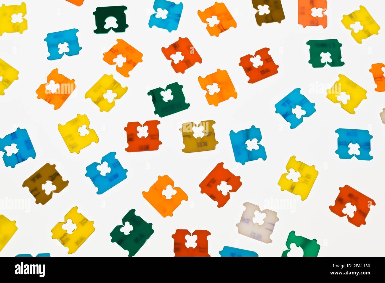 Colorful plastic bread clips on white translucent background Stock ...