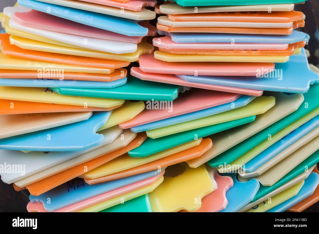 Stacked colorful plastic bread clips Stock Photo - Alamy